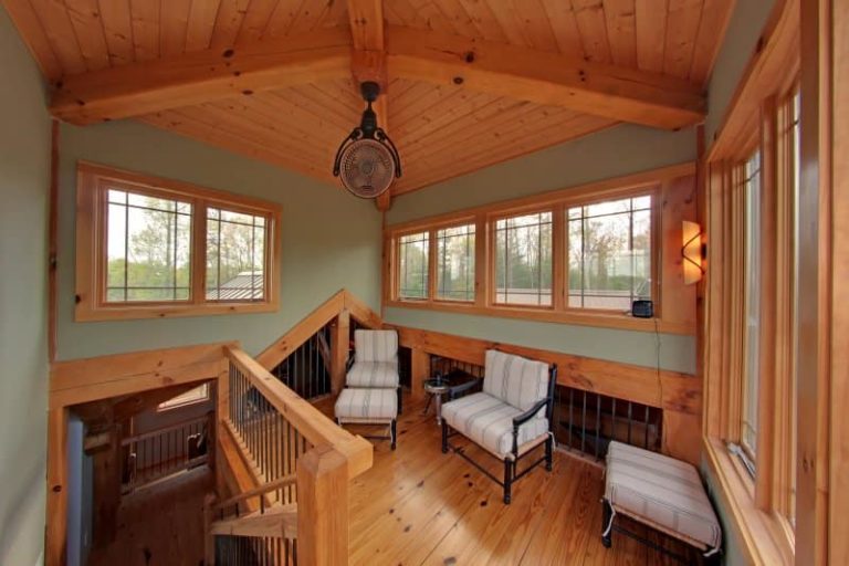Timber frame trusses create an open and dramatic effect